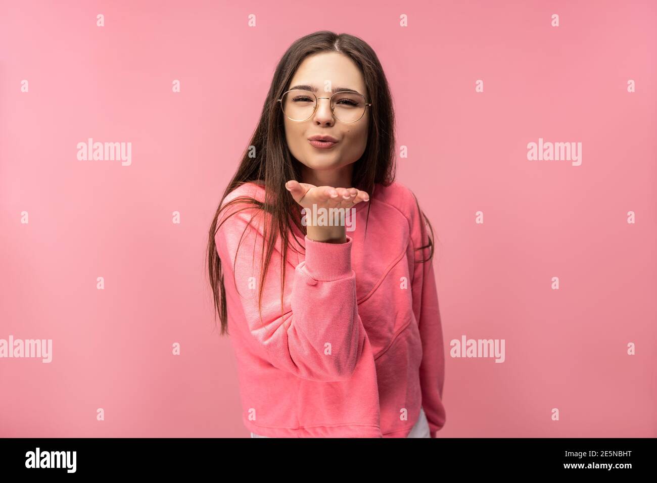 Woman blows kiss showing hi-res stock photography and images - Alamy