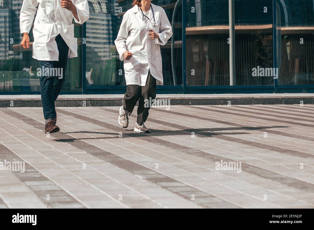 in full growth. medical professionals running to the rescue Stock Photo ...