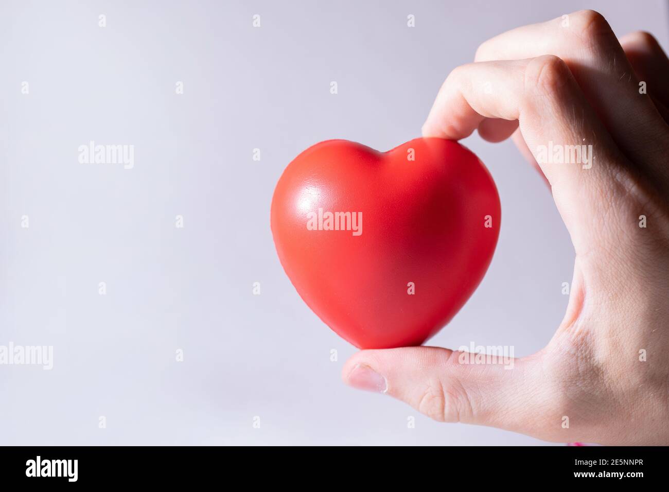close up. small heart in a human hand Stock Photo - Alamy