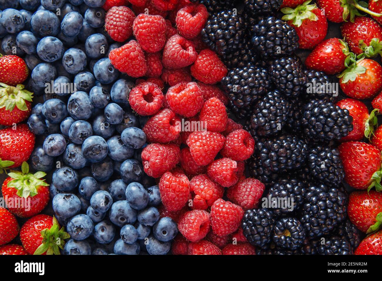 Healthy mixed fruit and ingredients with strawberry, raspberry ...