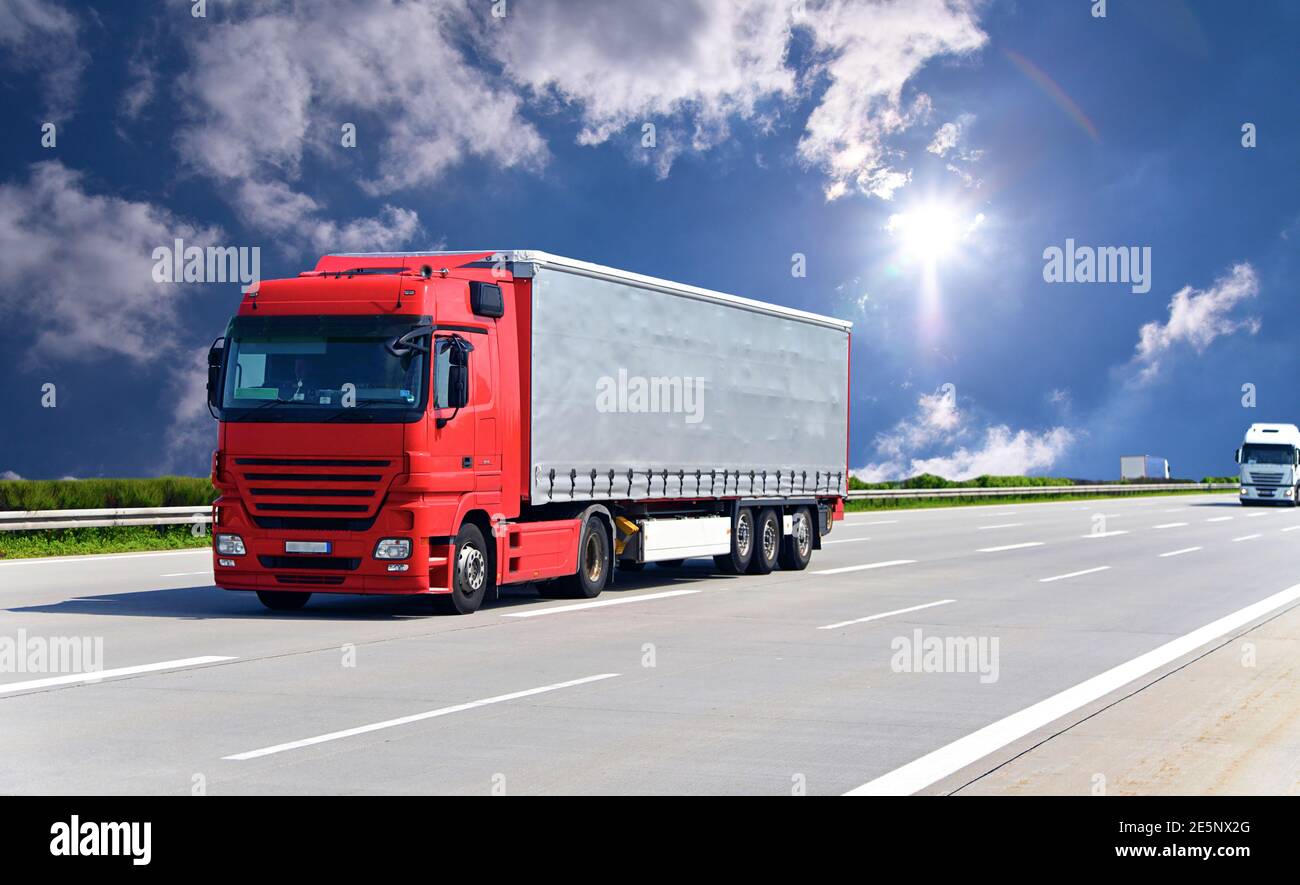 road transport of goods by truck - trade and logistics Stock Photo - Alamy