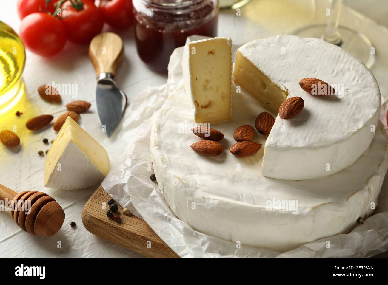 Concept of tasty eating with camembert on white table, top view Stock ...