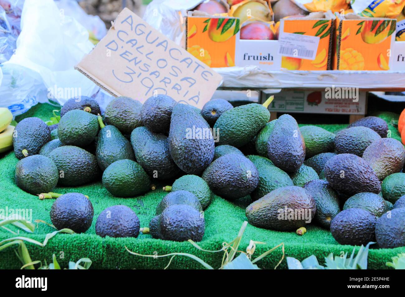 Avocados for sale at a market stall in Spain Stock Photo - Alamy