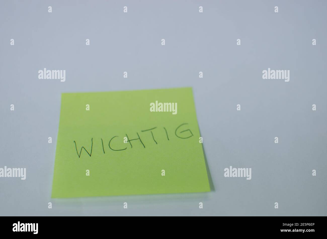 post it note with important on white background Stock Photo - Alamy