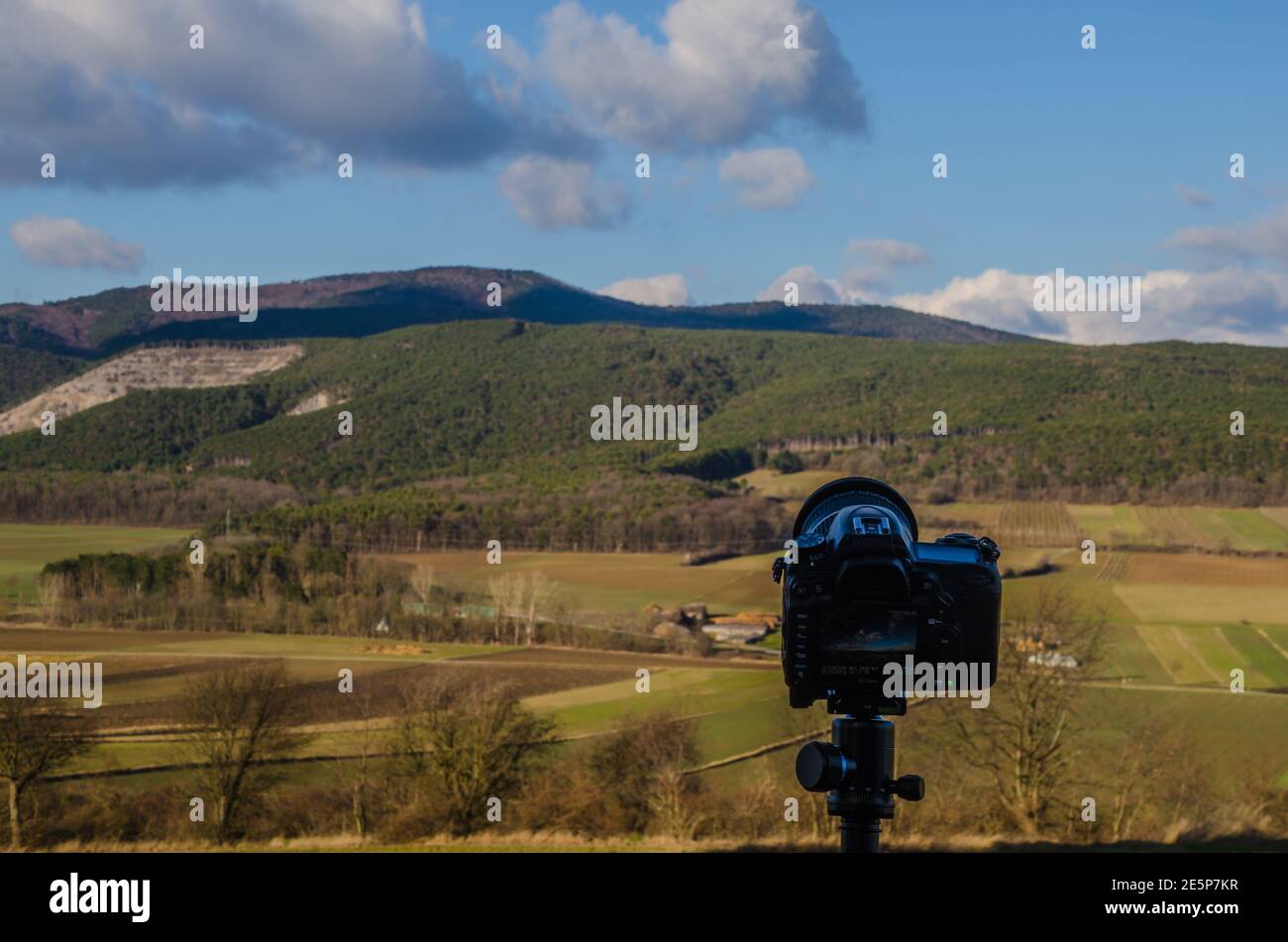 camera with mountains and green landscape Stock Photo - Alamy