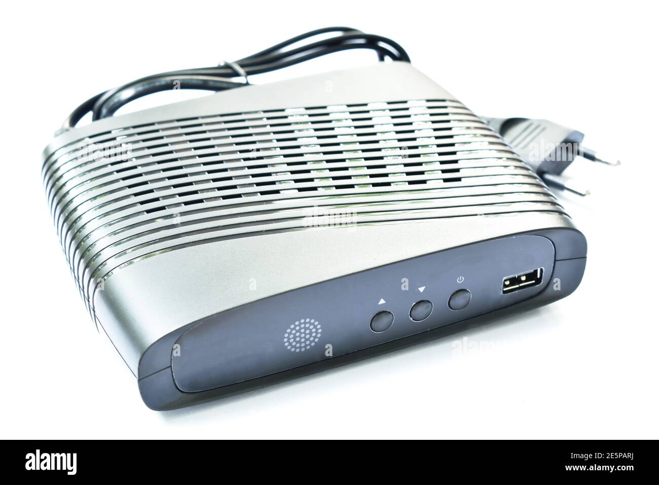 black digital television set top box receiver with plug in on white ...