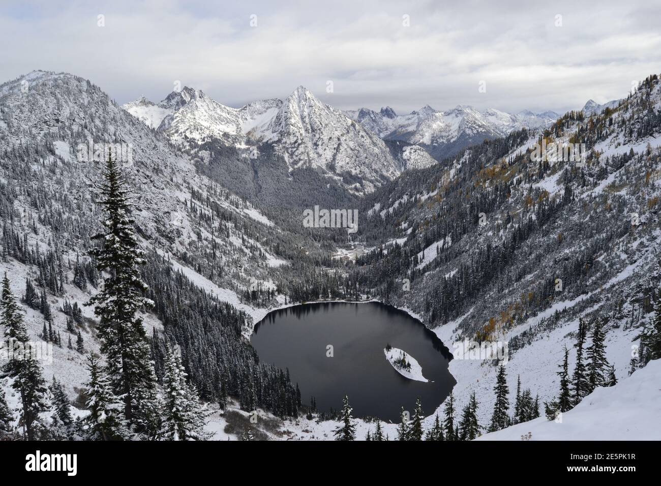 View of snowy Lake Ann and the cascades from the Maple Pass loop trail ...