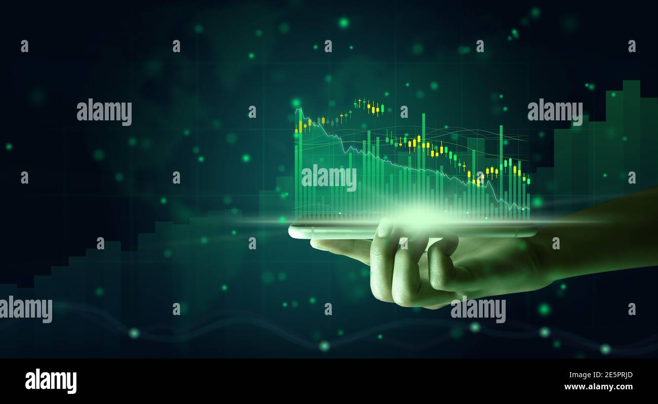 Businessman using mobile analysing stock market financial data and ...