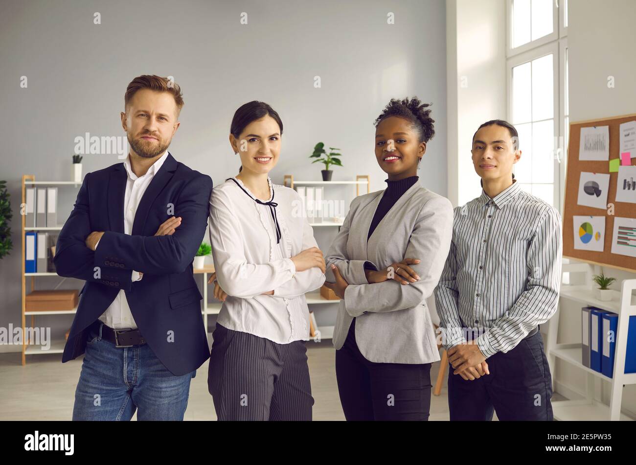 Office group diversity standing hi-res stock photography and images - Alamy