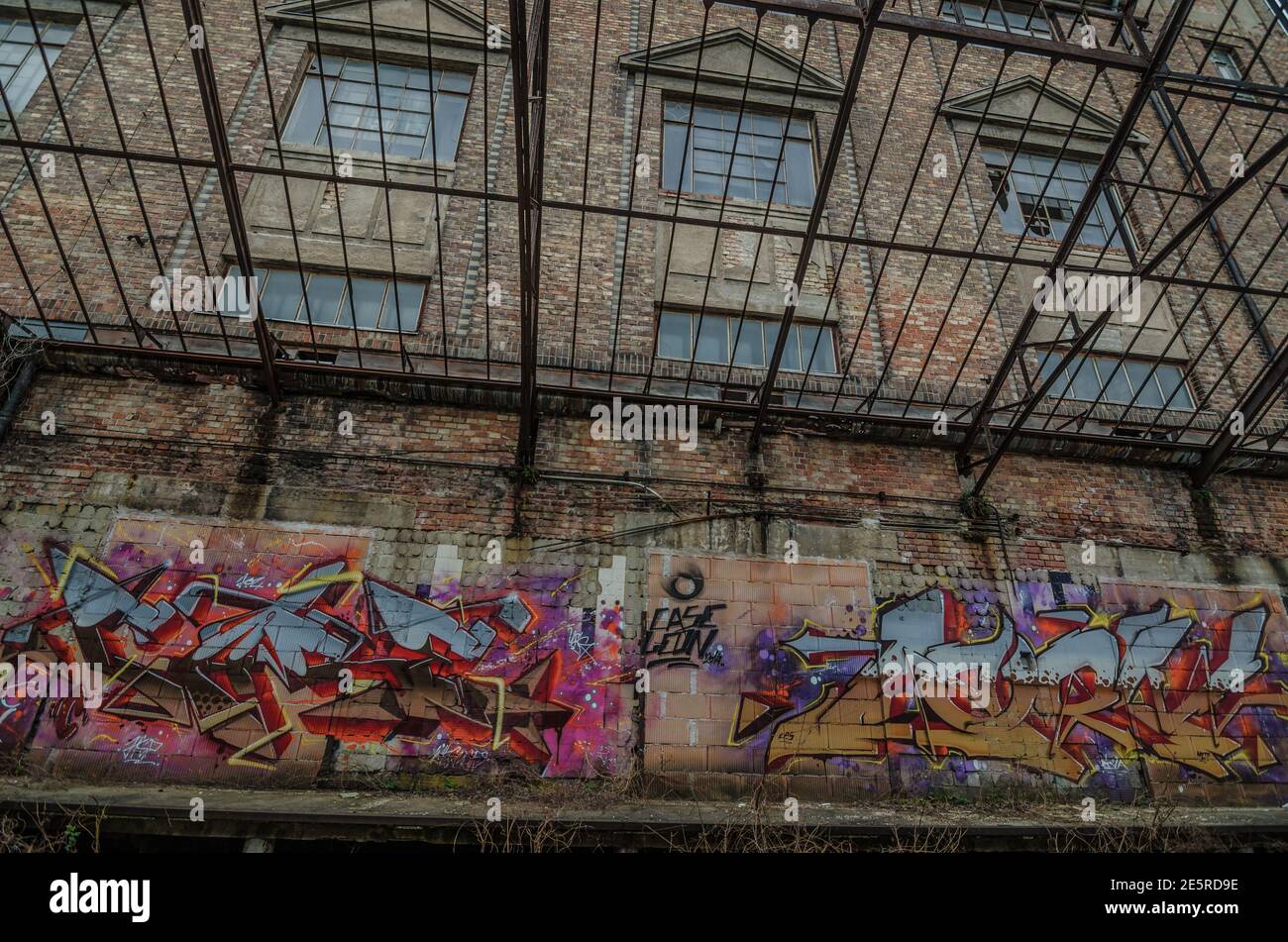 old factory with colorful graffiti Stock Photo - Alamy