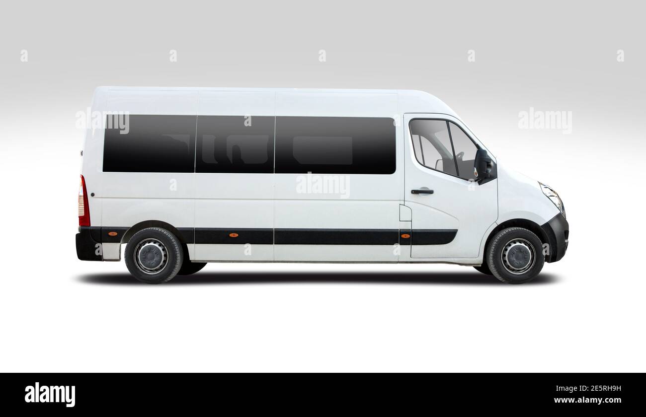 White minibus side view isolated on white background Stock Photo - Alamy