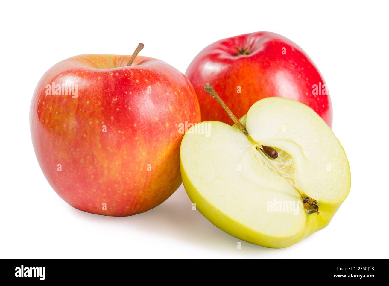 Two red apple with one cutted on half isolated on white background ...