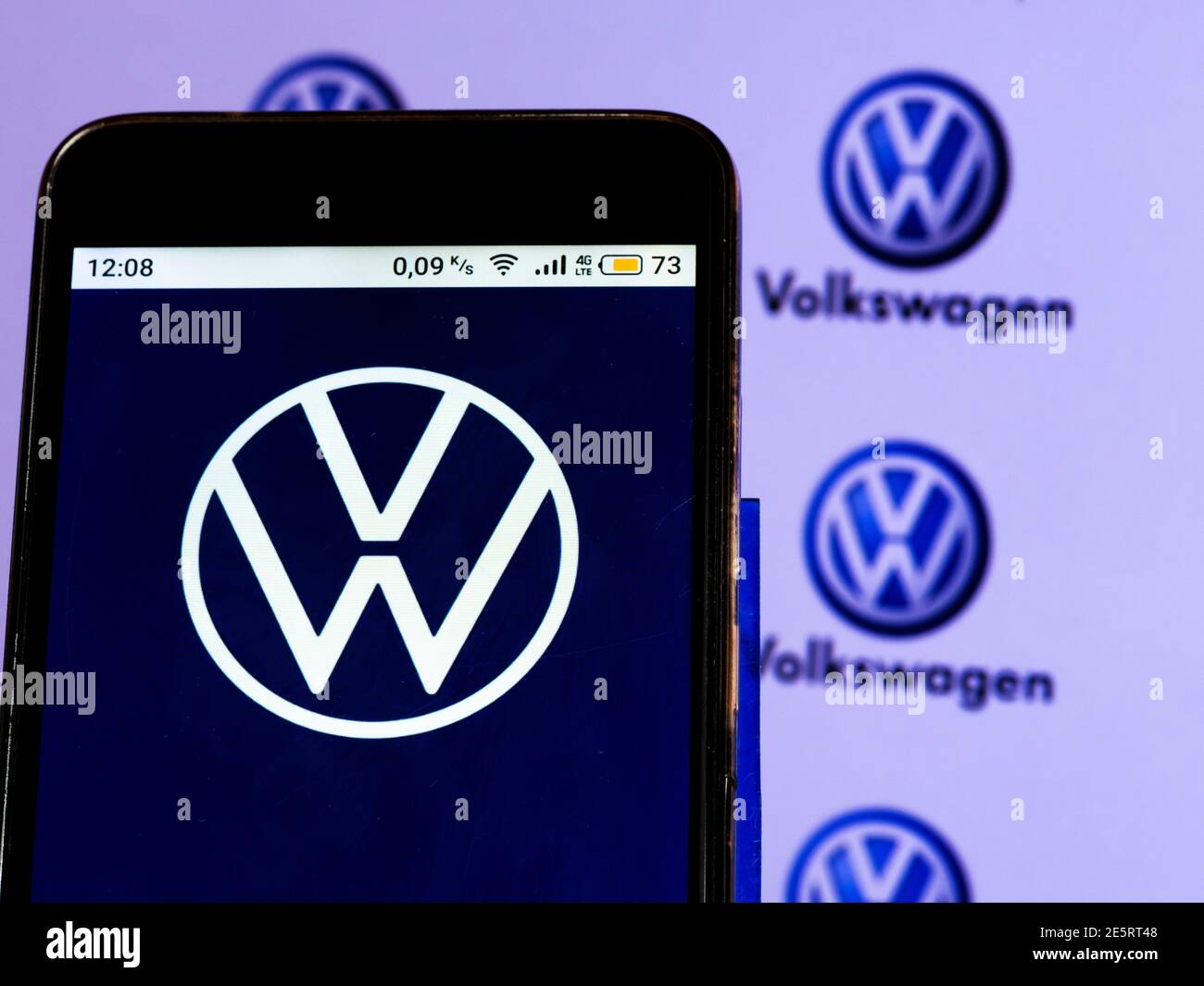 In this photo illustration a Volkswagen Group logo seen displayed on a ...