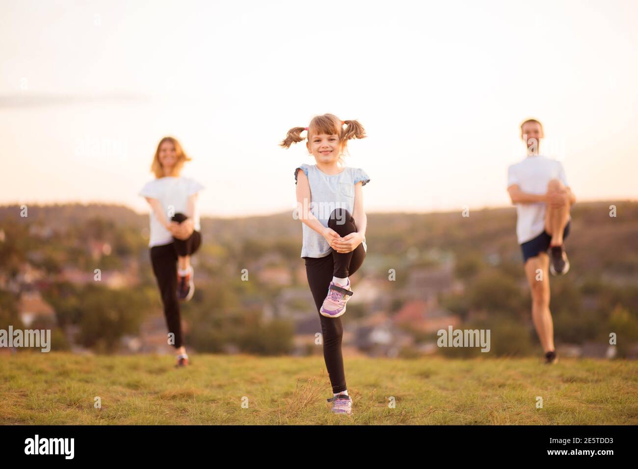 Kid and parent exercise hi-res stock photography and images - Alamy