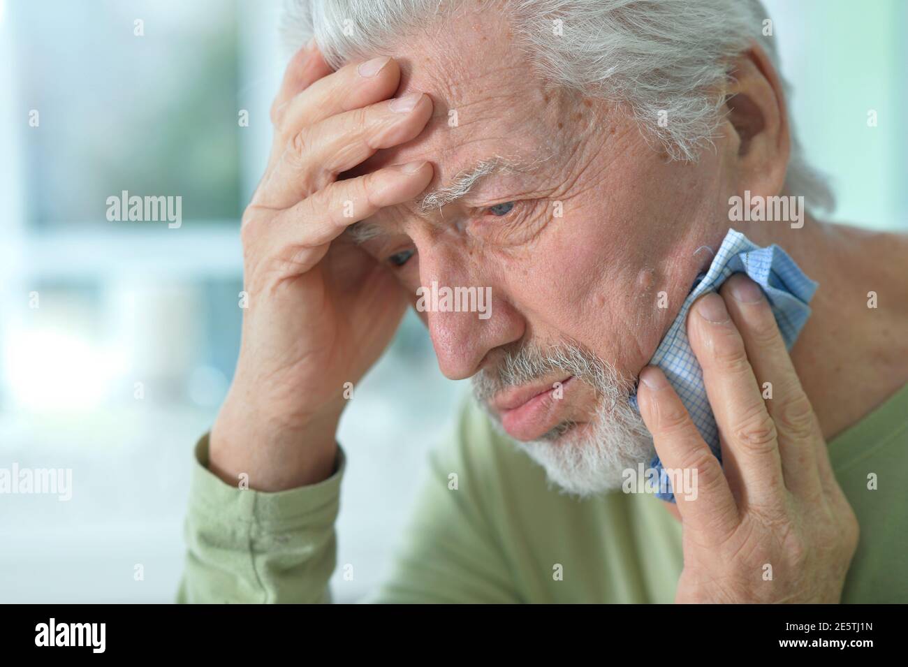 Close up portrait of sad sick senior man with toothache Stock Photo - Alamy