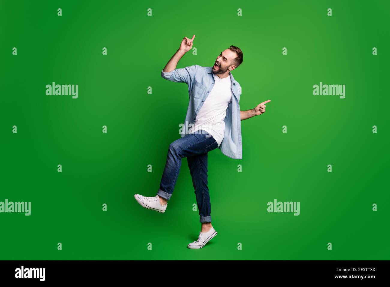 Full size profile photo of optimistic guy dancing wear blue shirt jeans ...
