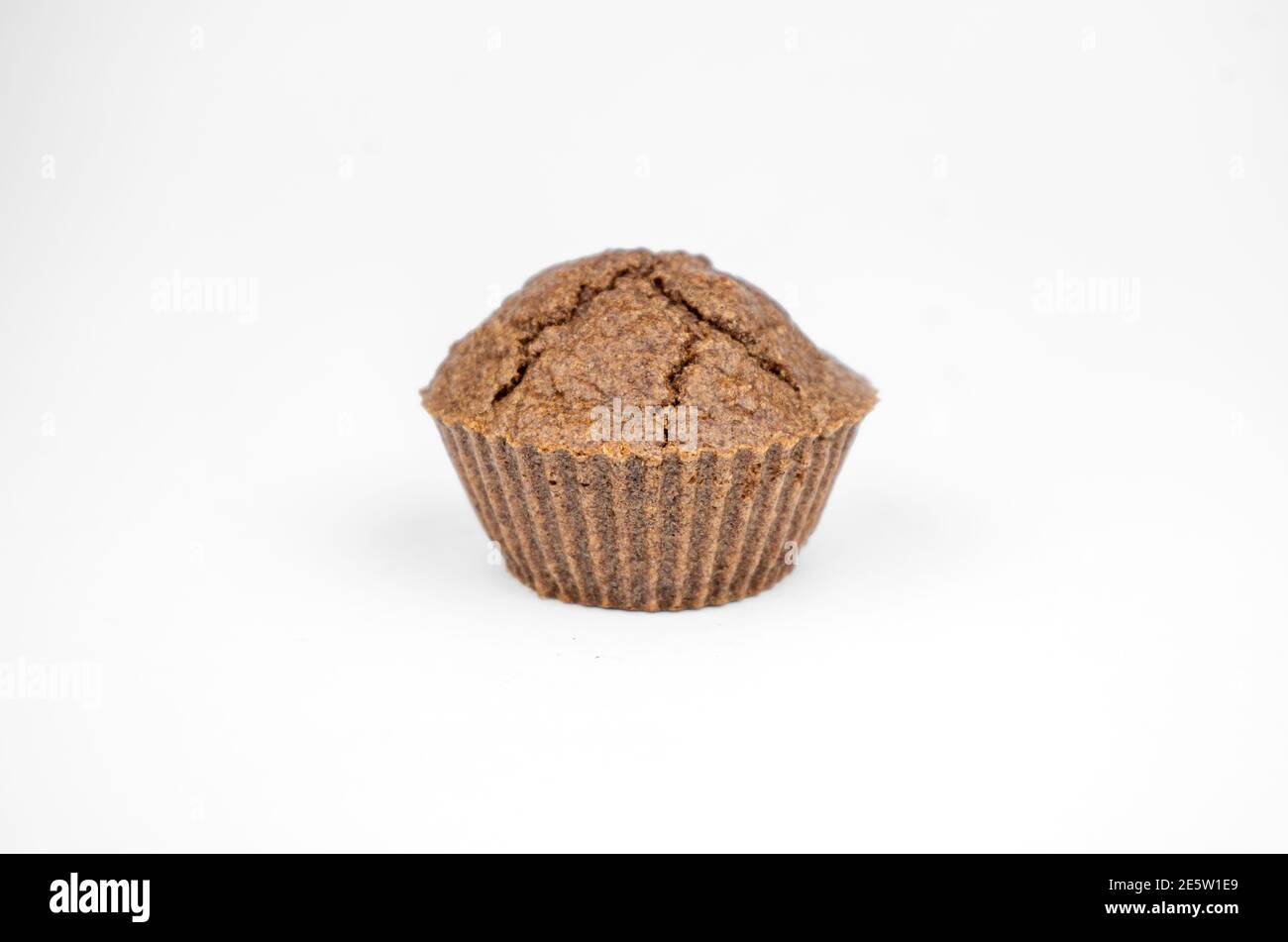 Homemade chocolate brown muffins isolated on white background Stock ...