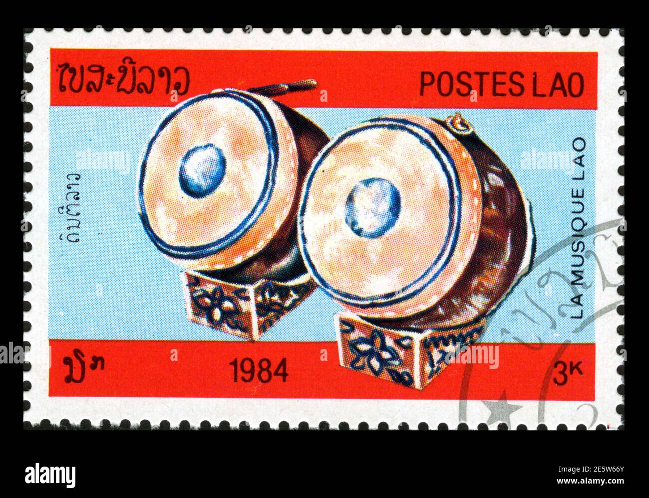 Stamp print in Laos, musical instruments, drums Stock Photo - Alamy