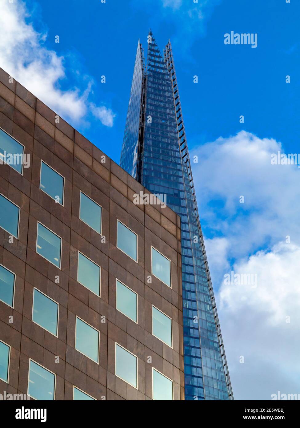 One London Bridge office block built in 1986 with the Shard Tower built ...