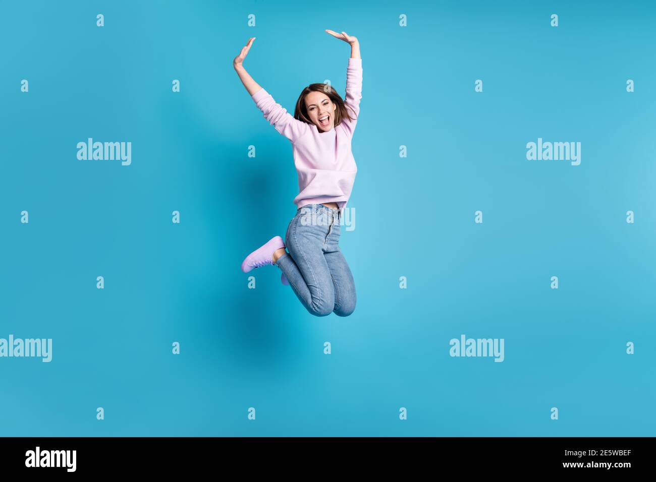 Full body photo of crazy excited girl jump enjoy childish free time ...