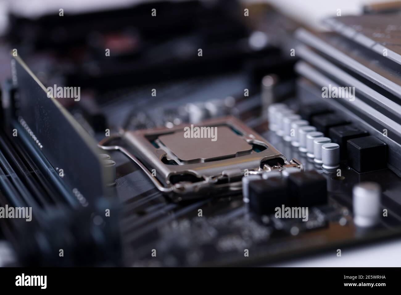 Closeup of black motherboard with installed processor Stock Photo - Alamy