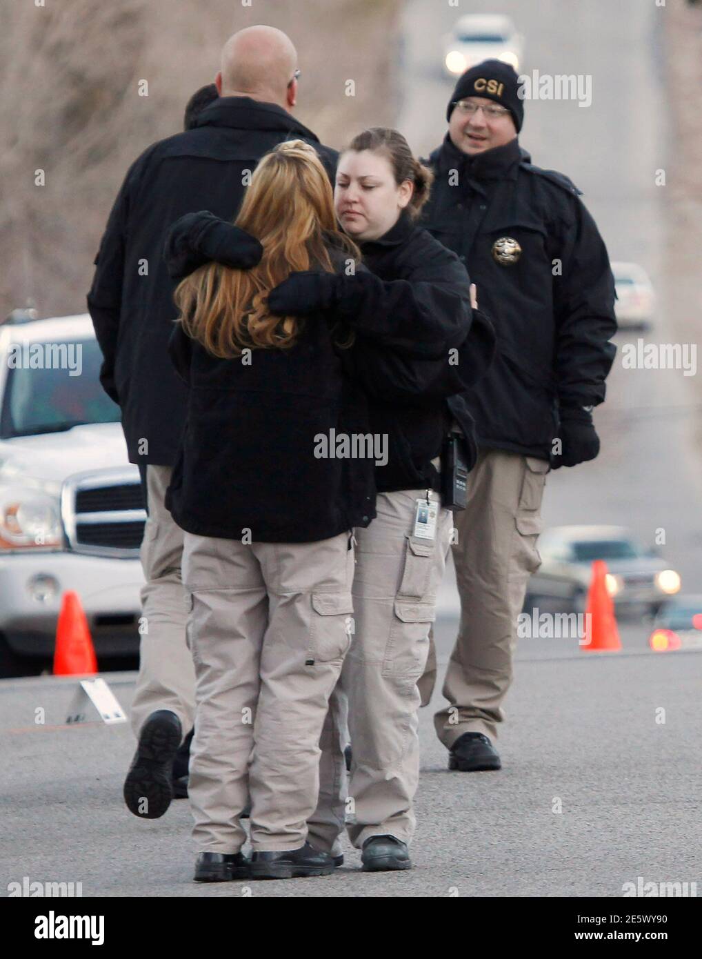 Two police officers hug in hi-res stock photography and images - Alamy