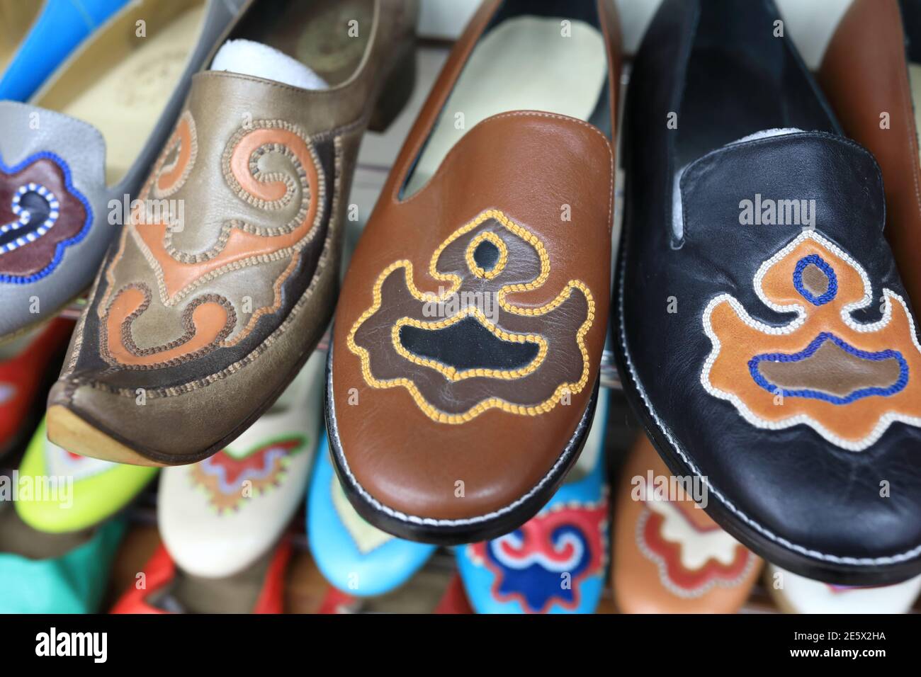 Tatar national leather shoes on shelf in store Stock Photo - Alamy