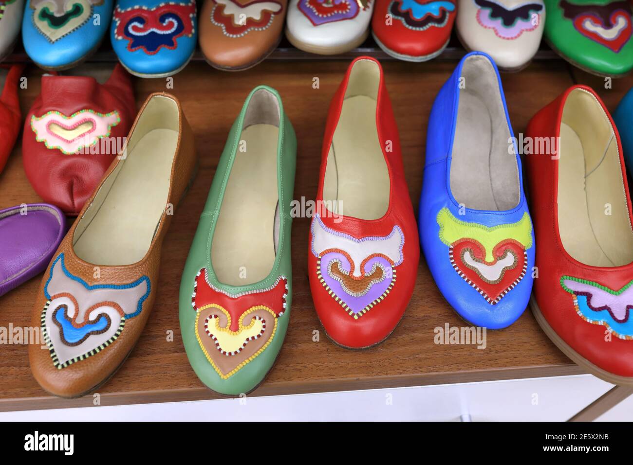 Tatar national shoes on shelf in store Stock Photo - Alamy