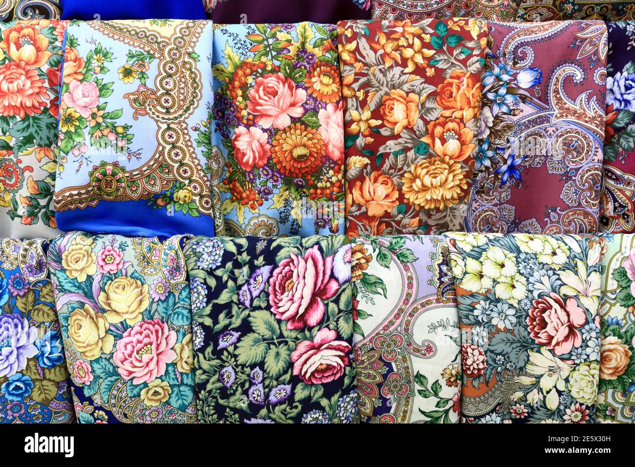 Various shawls as background in the store Stock Photo - Alamy