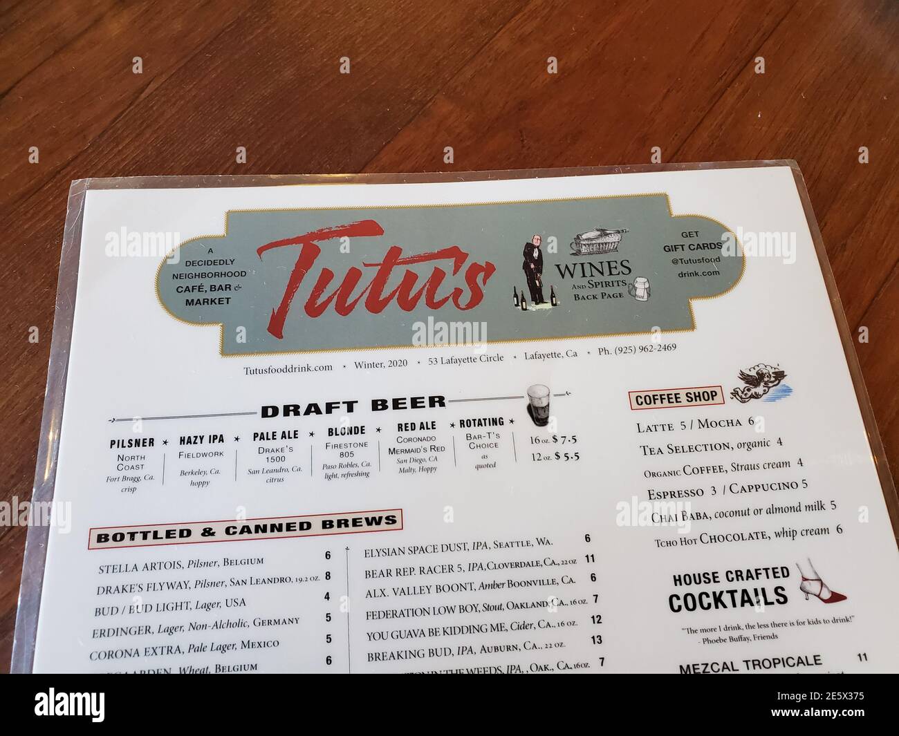Photograph of a food and drinks menu featuring the Tutu's Food and ...