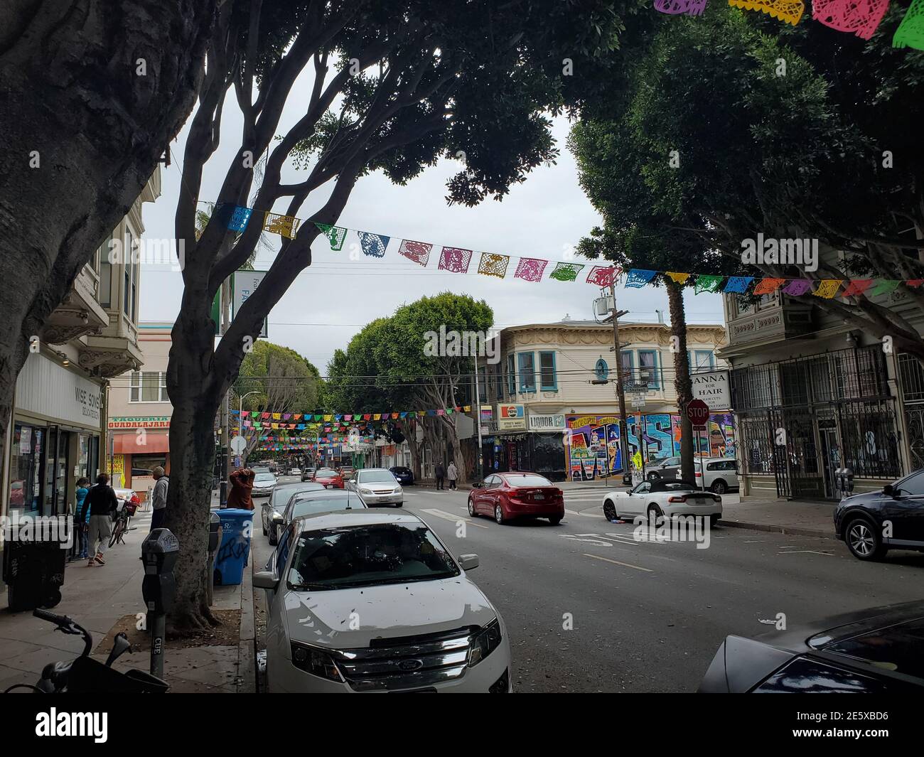 Photograph of cars parked and driving along Shotwell Street in the ...