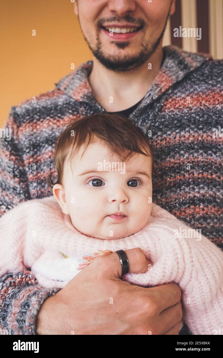 Dad hugging her little baby girl Stock Photo - Alamy