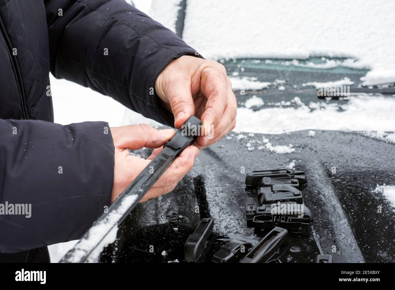 Windshield broken wiper blades replacement, winter scene Stock Photo ...