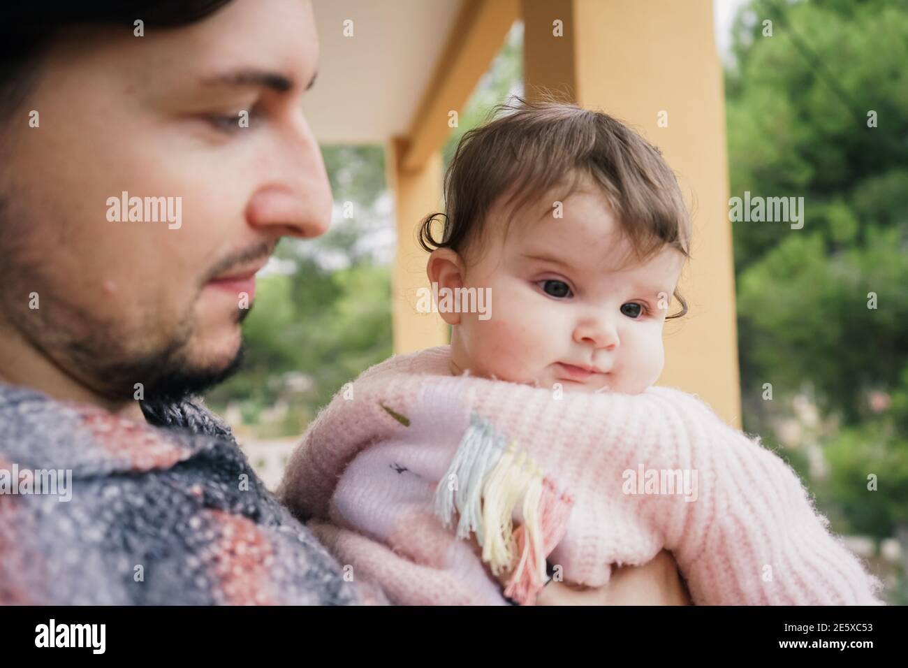 Dad hugging her little baby girl Stock Photo - Alamy
