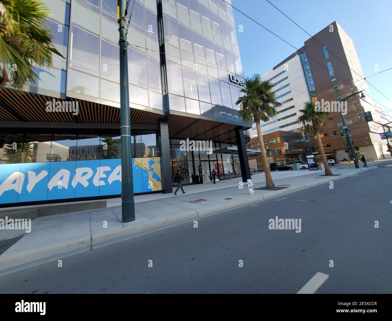 Low-angle shot of a commercial with a visible Uber sign at the new ...