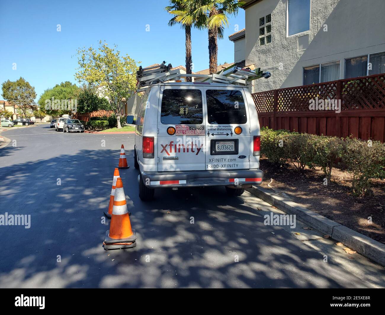 Comcast Xfinity truck parked on road in suburban neighborhood, San ...