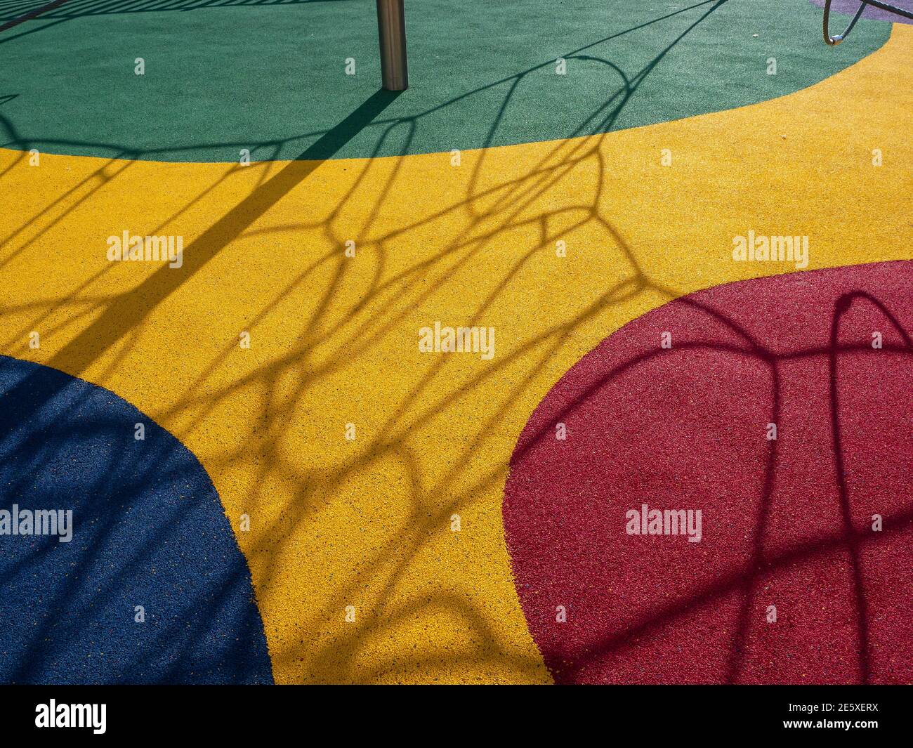 Brightly colored rubber flooring in a children's playground Stock Photo ...