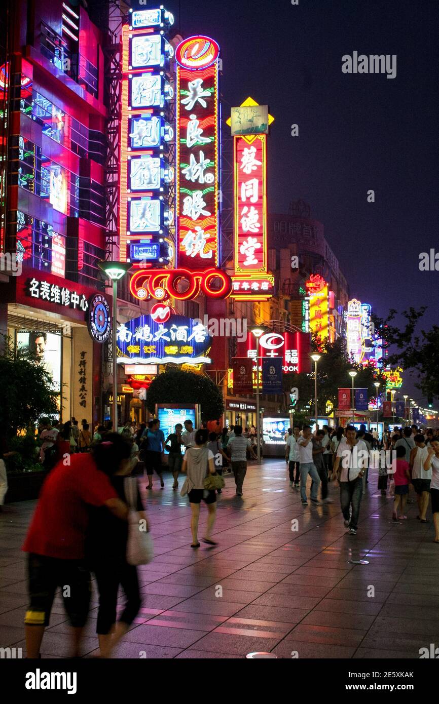 Bright neon advertising along Nanjing pedestrian road, in Shanghai ...