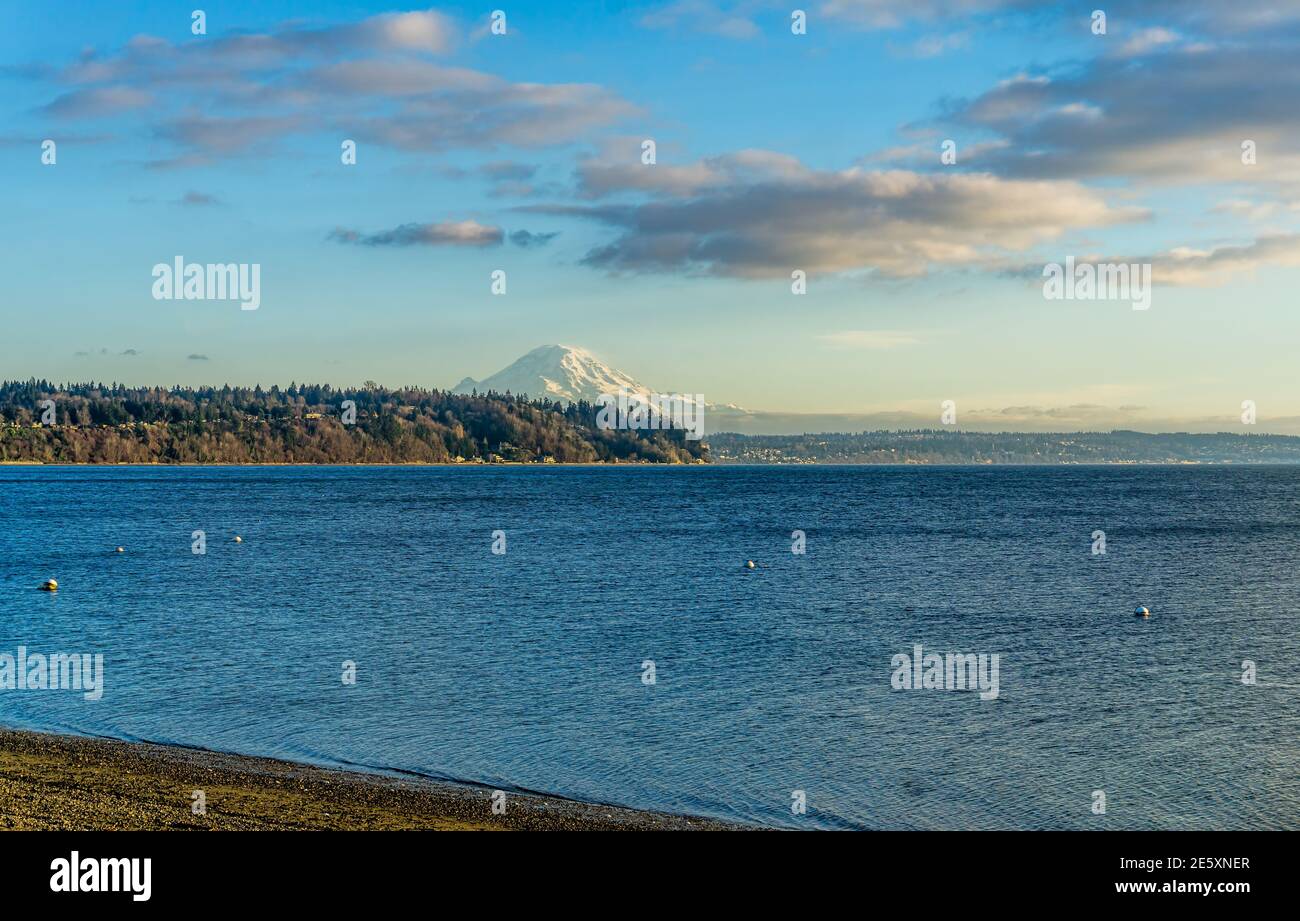 A view of Mount Rainier across the Puget Sound. Photo taken in Burien ...