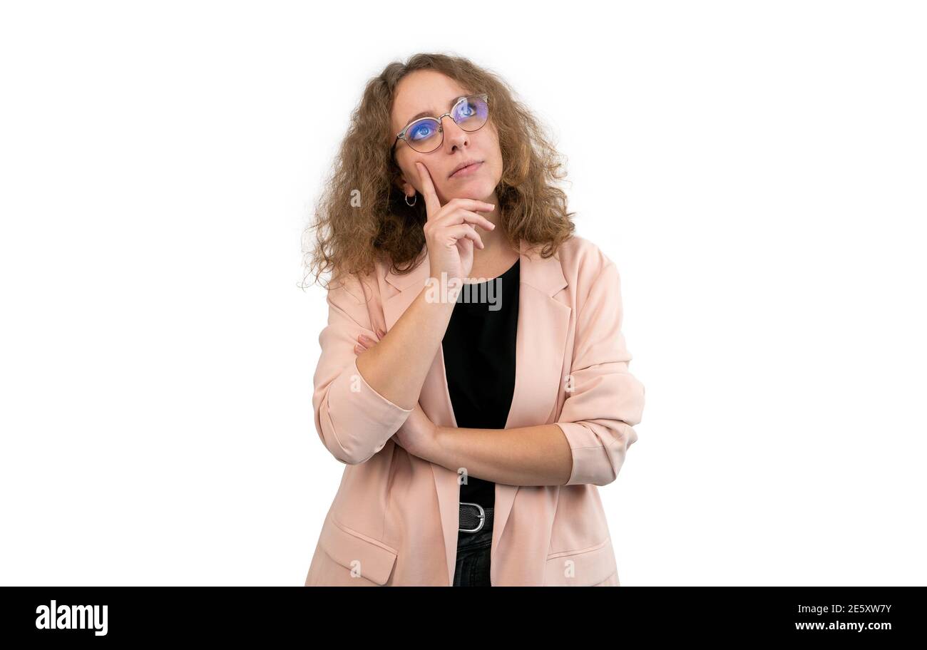 Portrait of a businesswoman thinking and looking up. Reflection concept ...