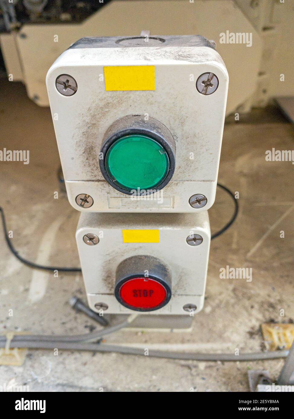 Green and Red Stop Buttons at Machine Control Stock Photo - Alamy