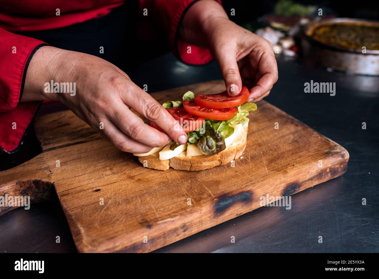 Stock photo of faceless chef doing a yummy toast of ham and cheese ...