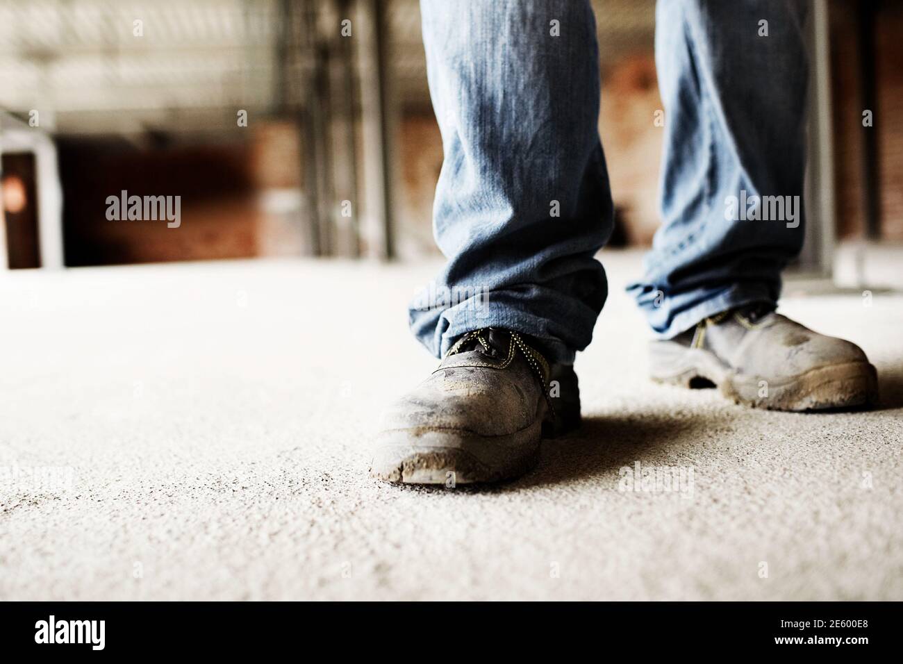 Closeup lowsection of a male construction worker at building site Stock ...
