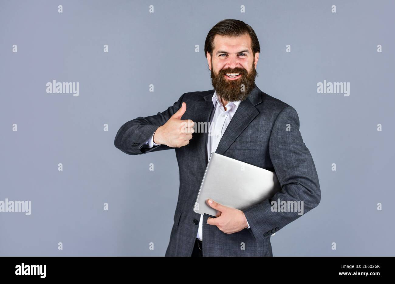 showing thumb up. brutal male with beard in suit. handsome ceo hold ...
