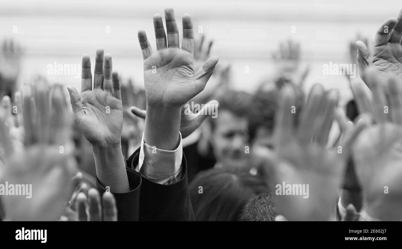 Raising hand silhouette Black and White Stock Photos & Images - Alamy