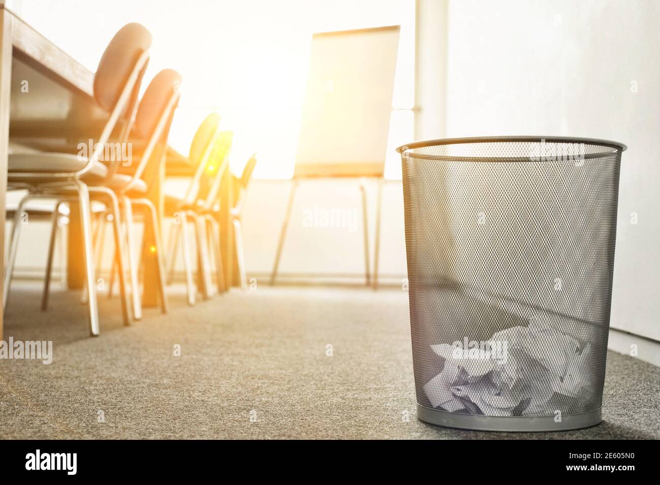 Trash Can in Meeting Room with lens flare Stock Photo - Alamy