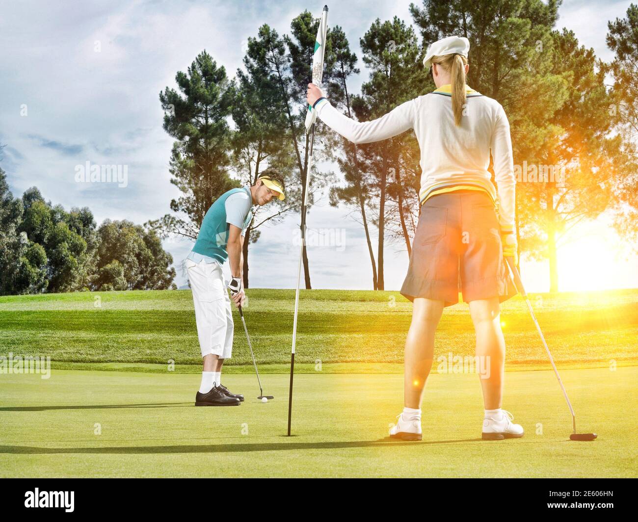 Golfer holding pin flag hi-res stock photography and images - Alamy