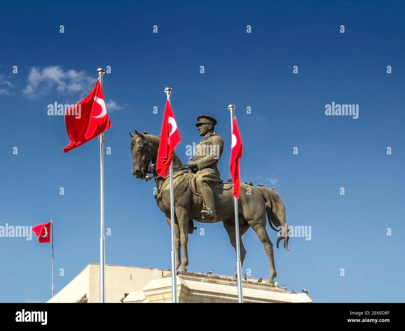 The statue of Ataturk and national flags of modern Turkey in Ulus ...