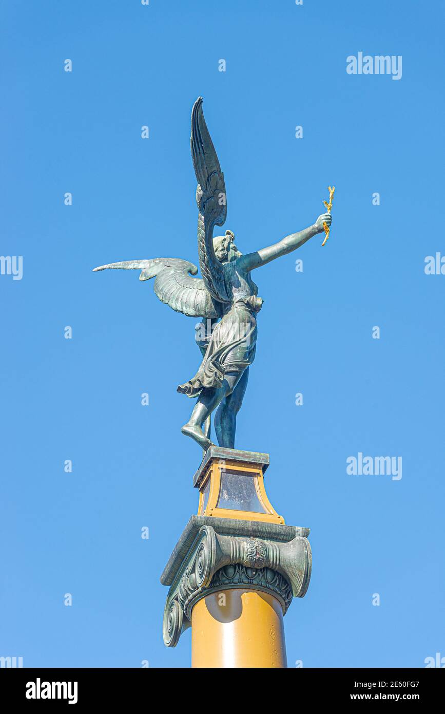 Statue of beautiful angel with wings at the top of column on the Cechuv ...