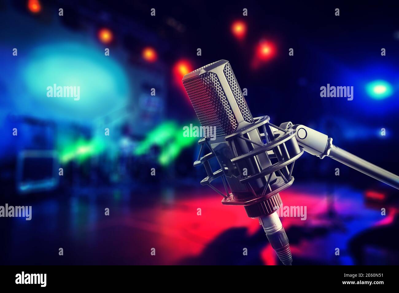 Professional studio microphone on stage during concert, blurred ...